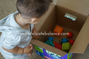 5 Play Activities for Babies with a Cardboard Box